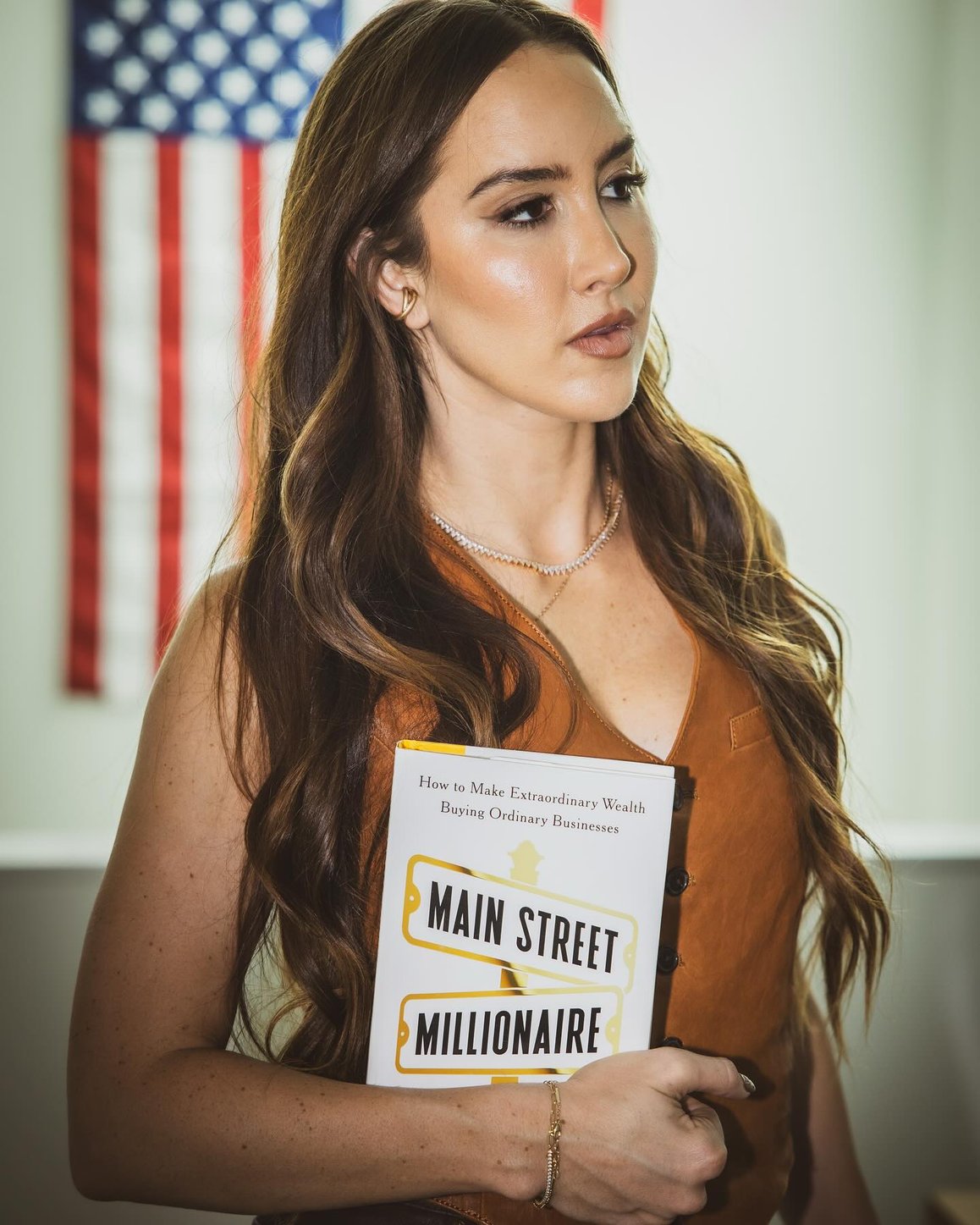 Codie Sanchez signs Main Street Millionaire!
